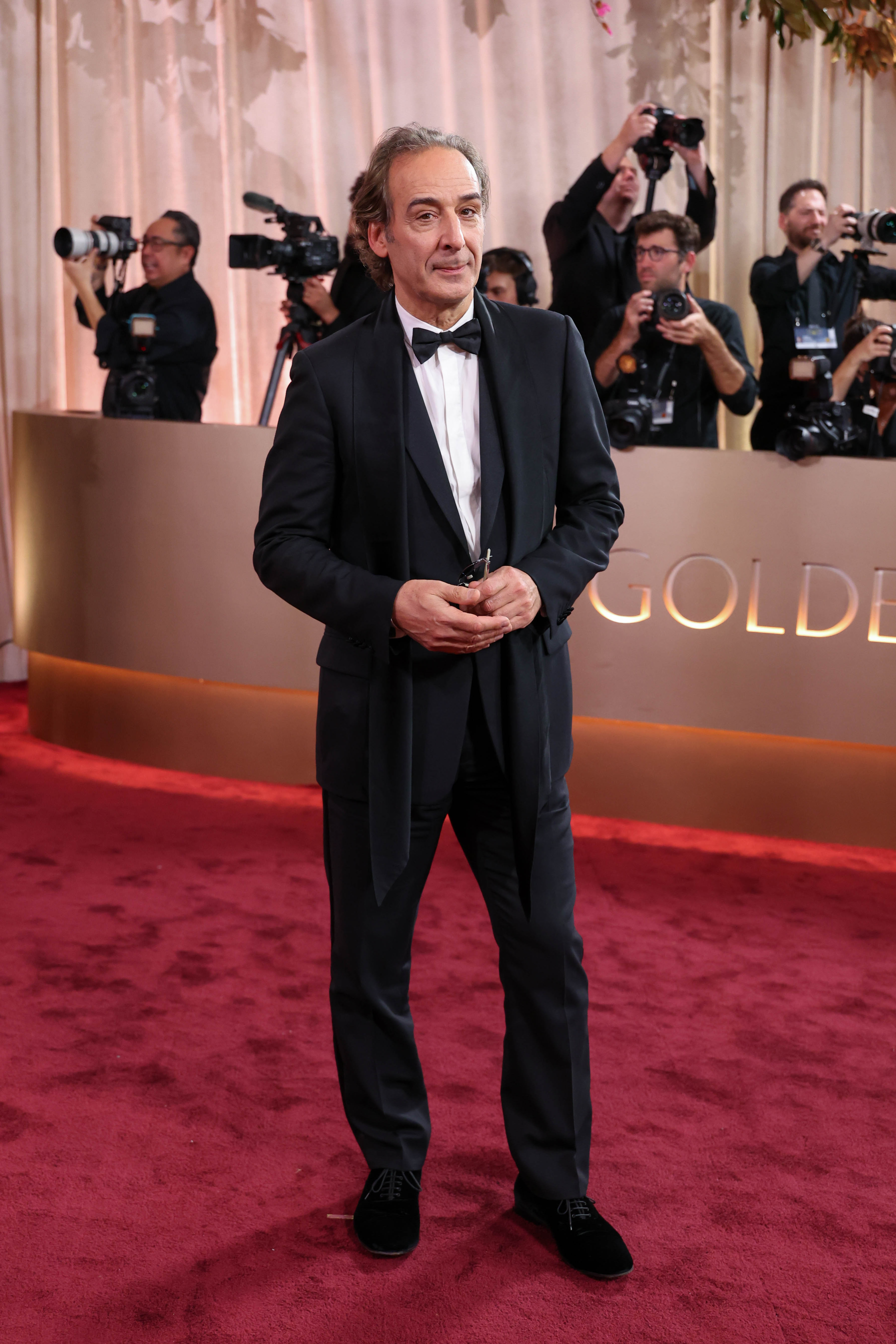 Alexandre Desplat arriving at the 83rd Annual Golden Globes - Arrivals ...